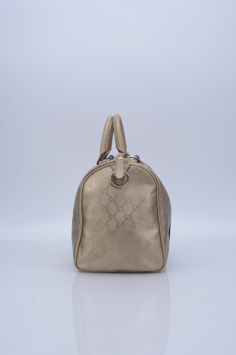 Gucci Boston Dorado – RAG
